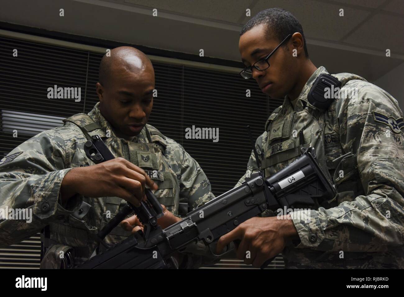 Staff Sgt. Jonathan Carthron (left) and Airman 1st Class Michael Brice, 4th Security Forces ...