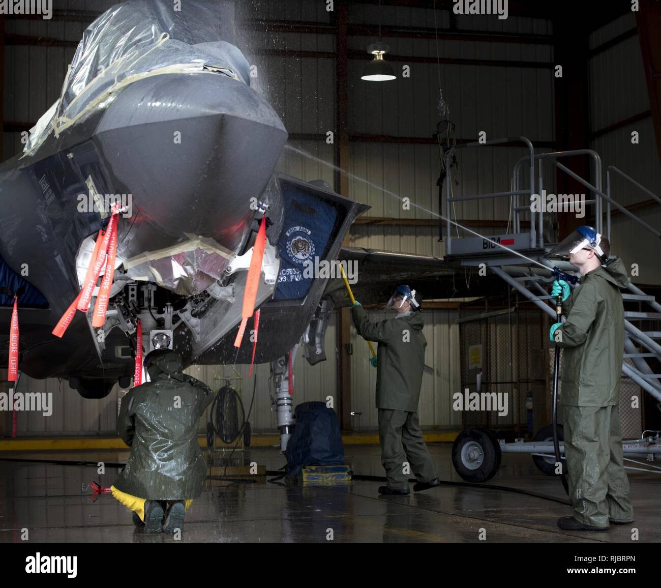 U.S. Air Force Col. Paul D. Moga, 33rd Fighter Wing commander, center ...