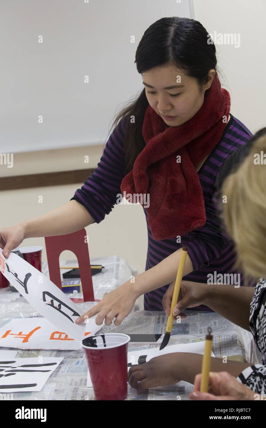 CAMP HANSEN, OKINAWA, Japan – Kumiko Tamashiro points to her example at ...