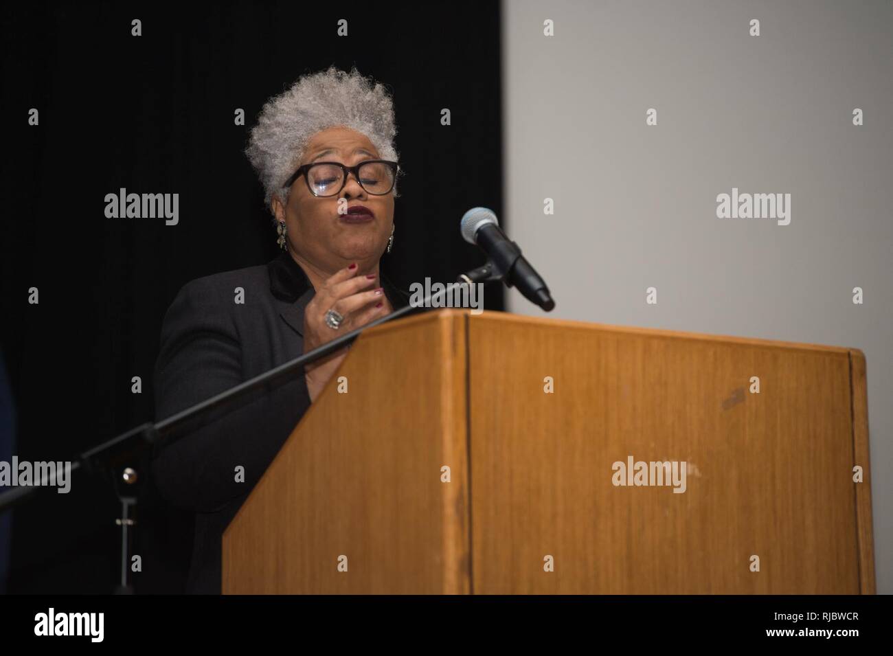 U.S. Air Force retired Chief Master Sgt. Deborah Rothwell recites the ...