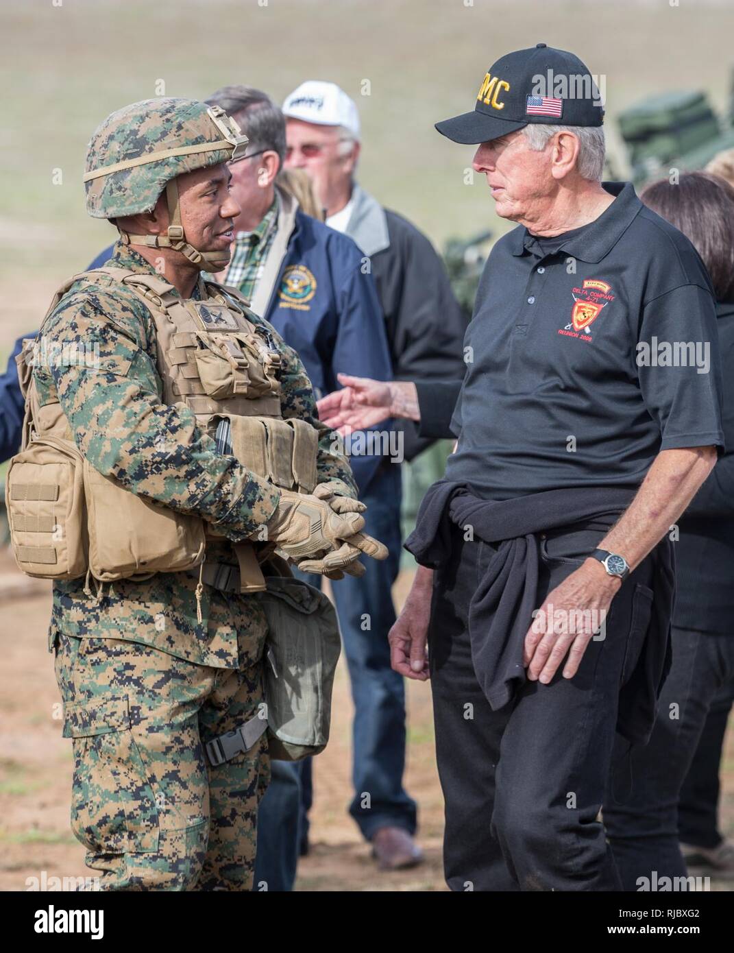 U.S. Marine Corps Gunnery Sgt. Jason Thompson, left, an artillery ...