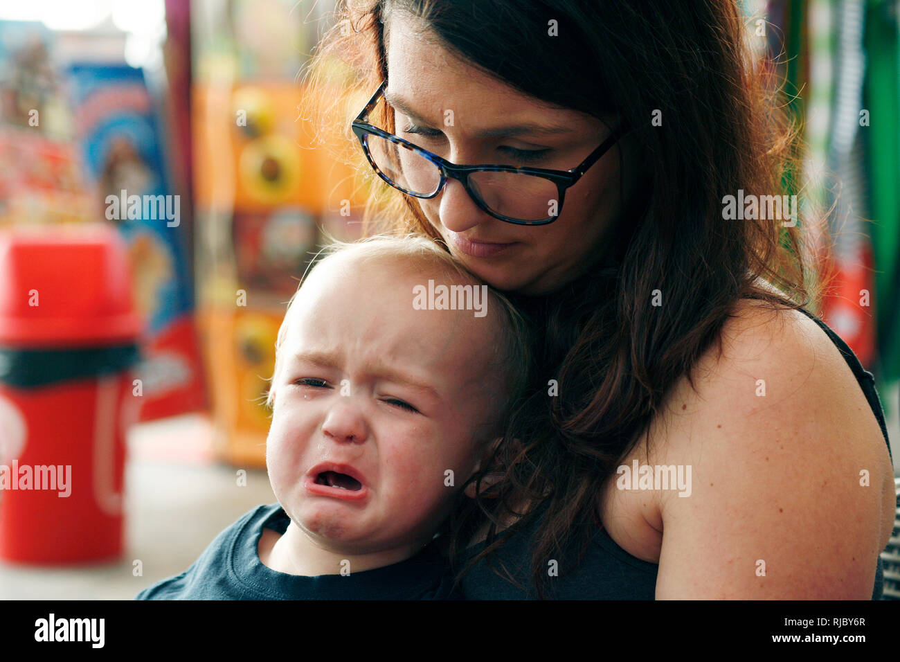Woman baby crying hi-res stock photography and images - Alamy