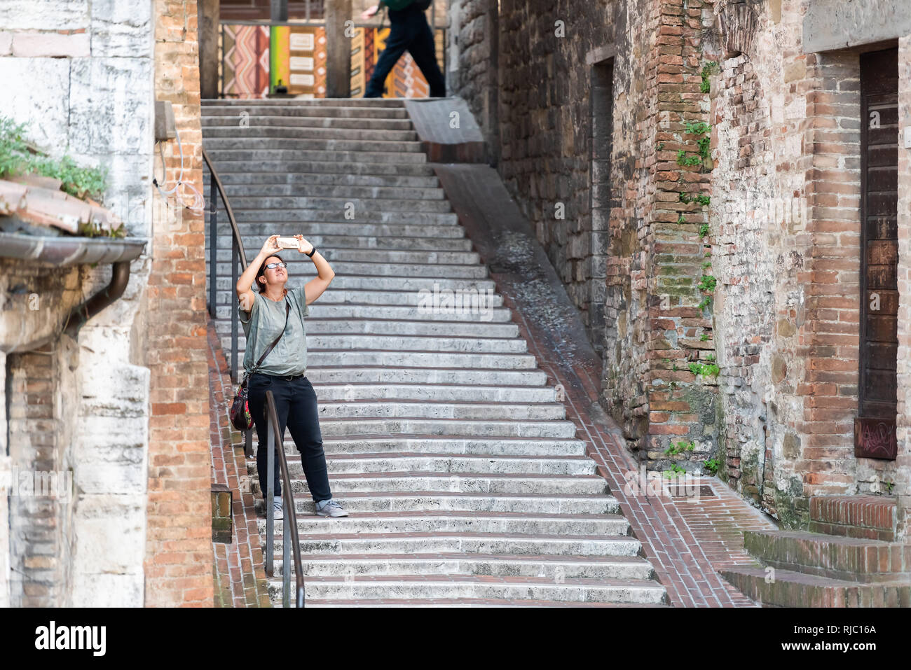 Perugia, Italy - August 29, 2018: City in Umbria with tourist woman ...