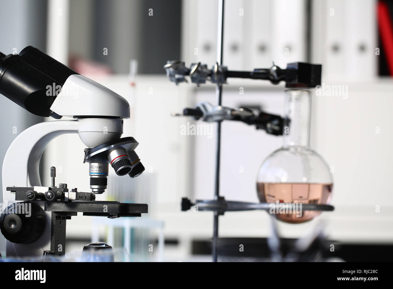 Head microscope on the background laboratory Stock Photo - Alamy