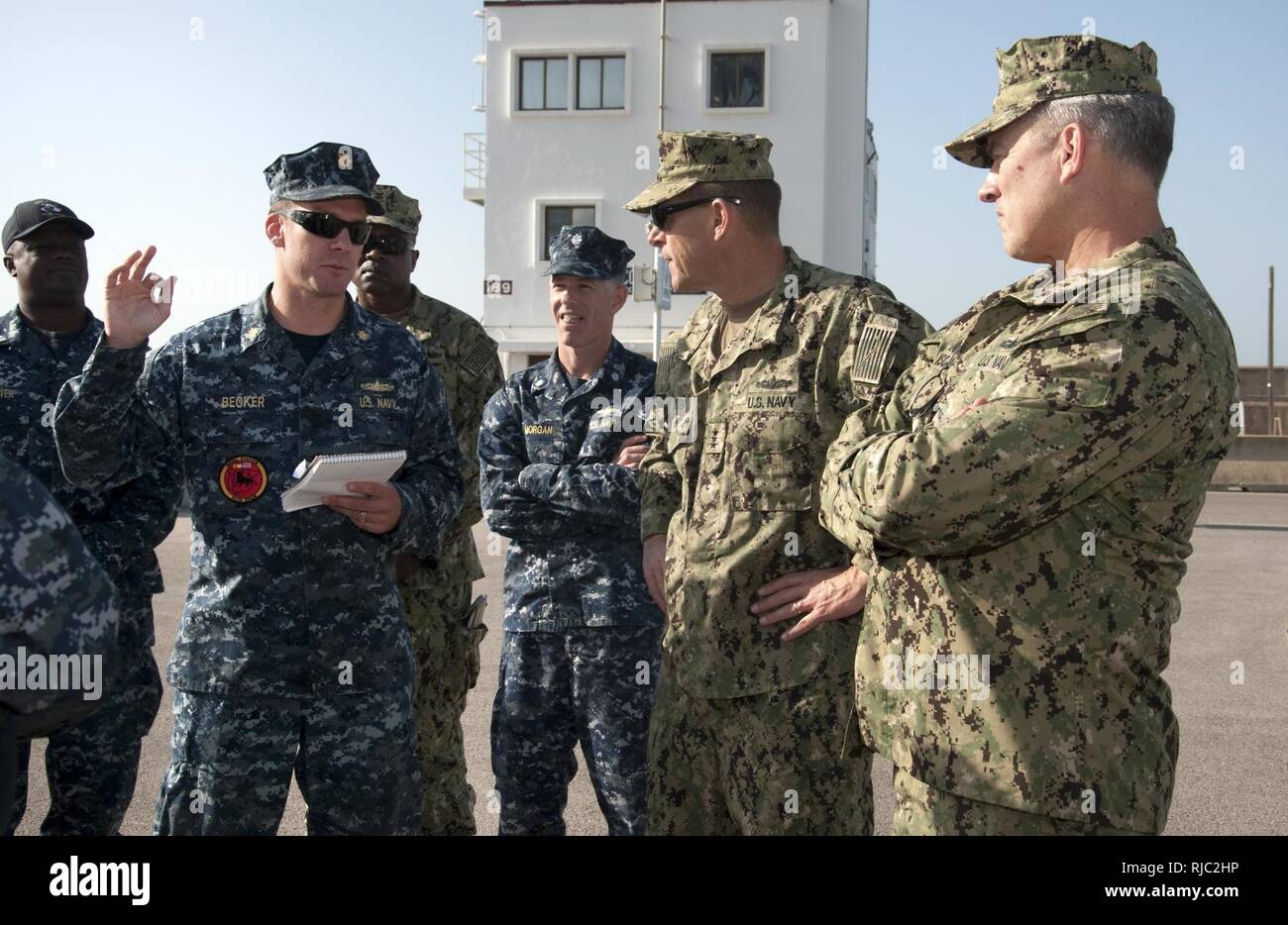 NAVAL STATION ROTA, Spain (Nov. 2, 2016) Lt. Cmdr. Charles Becker, left ...