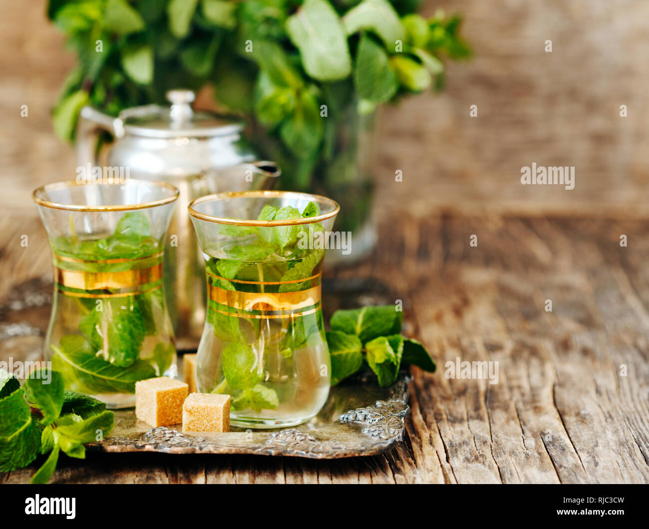 Mint tea with sugar cubes Stock Photo - Alamy