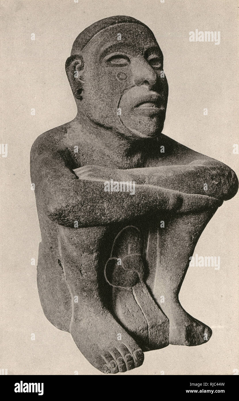 Aztec statue of a seated man - fire deity Huehueteotl Stock Photo - Alamy