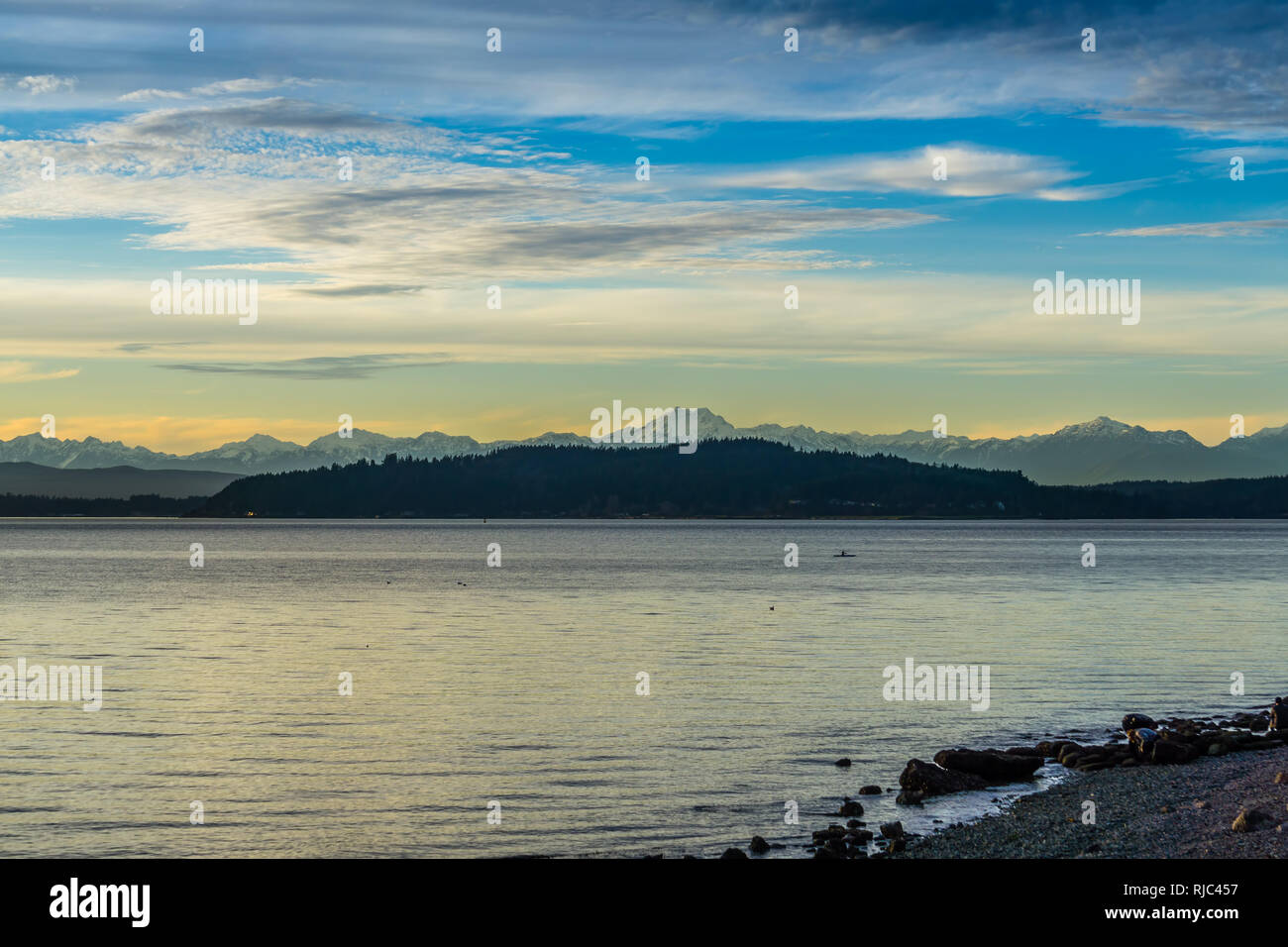 A view of the Olympic Mountain across the Puget Sound at sunset Stock ...