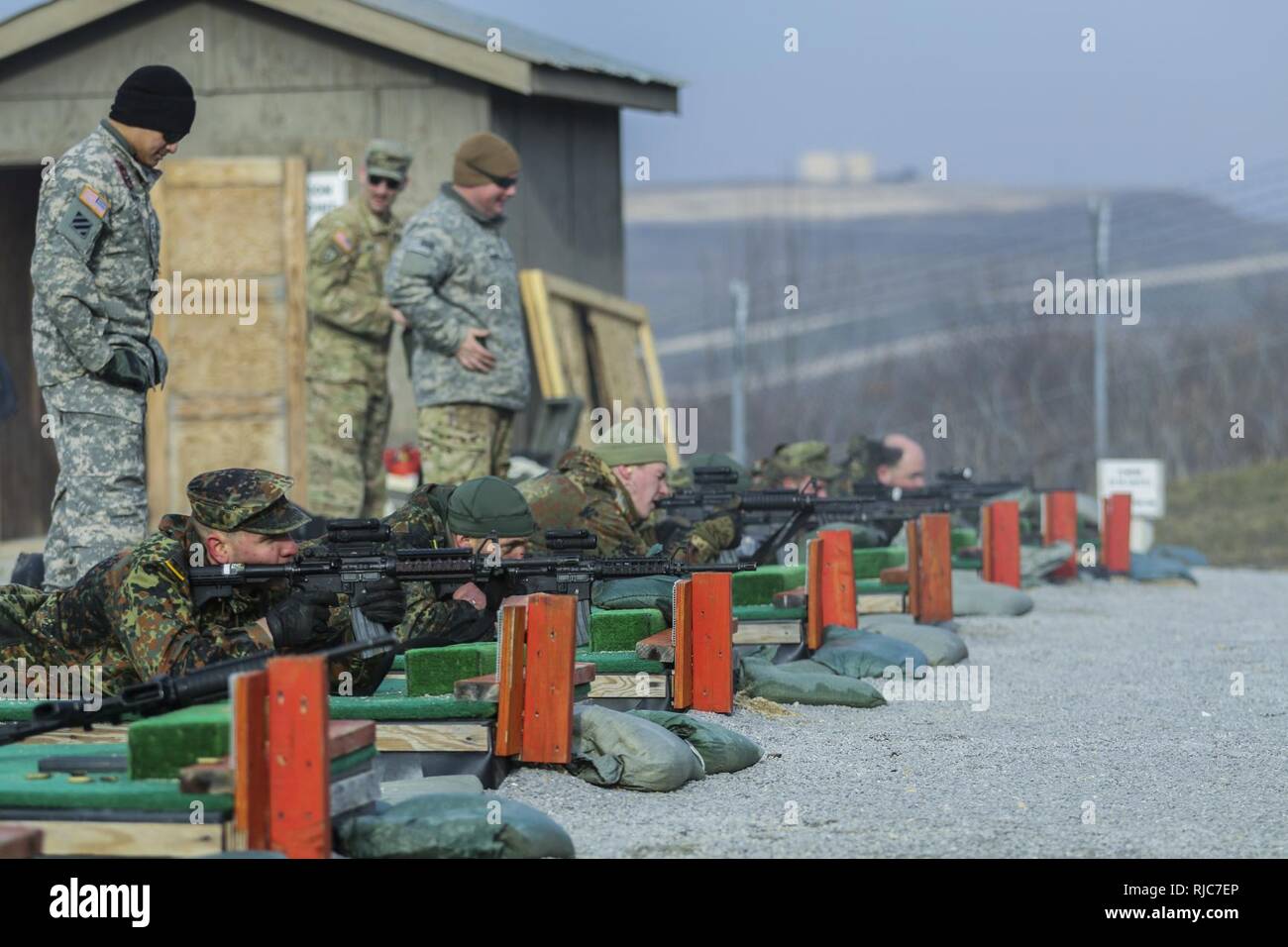 German Soldiers shoot the M4 Carbine during the U.S. Marksmanship Range ...