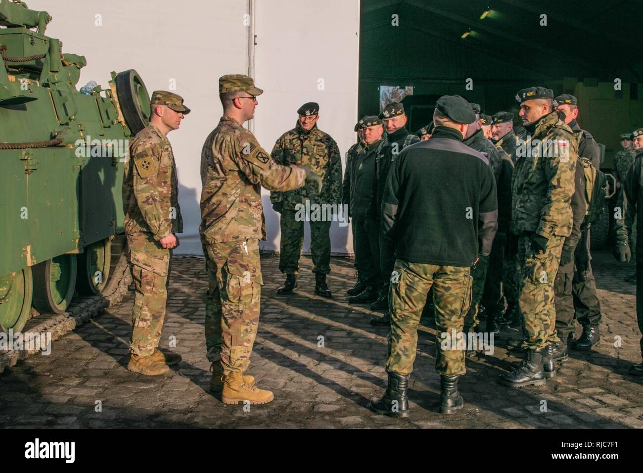 Capt. Gregory M. Earnest (second from left), commander of Company E ...