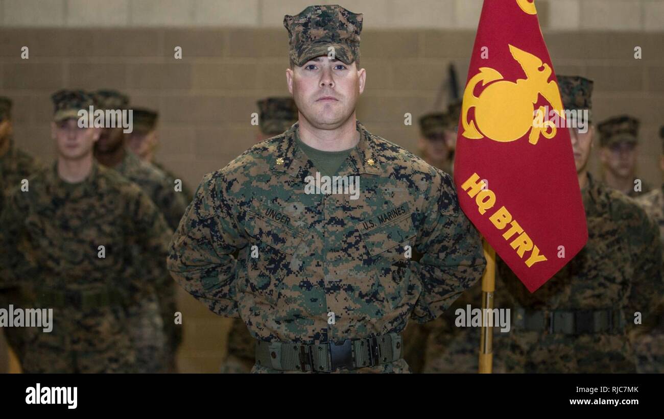 U.S. Marines with 11th Marine Regiment stand at parade rest during a ...