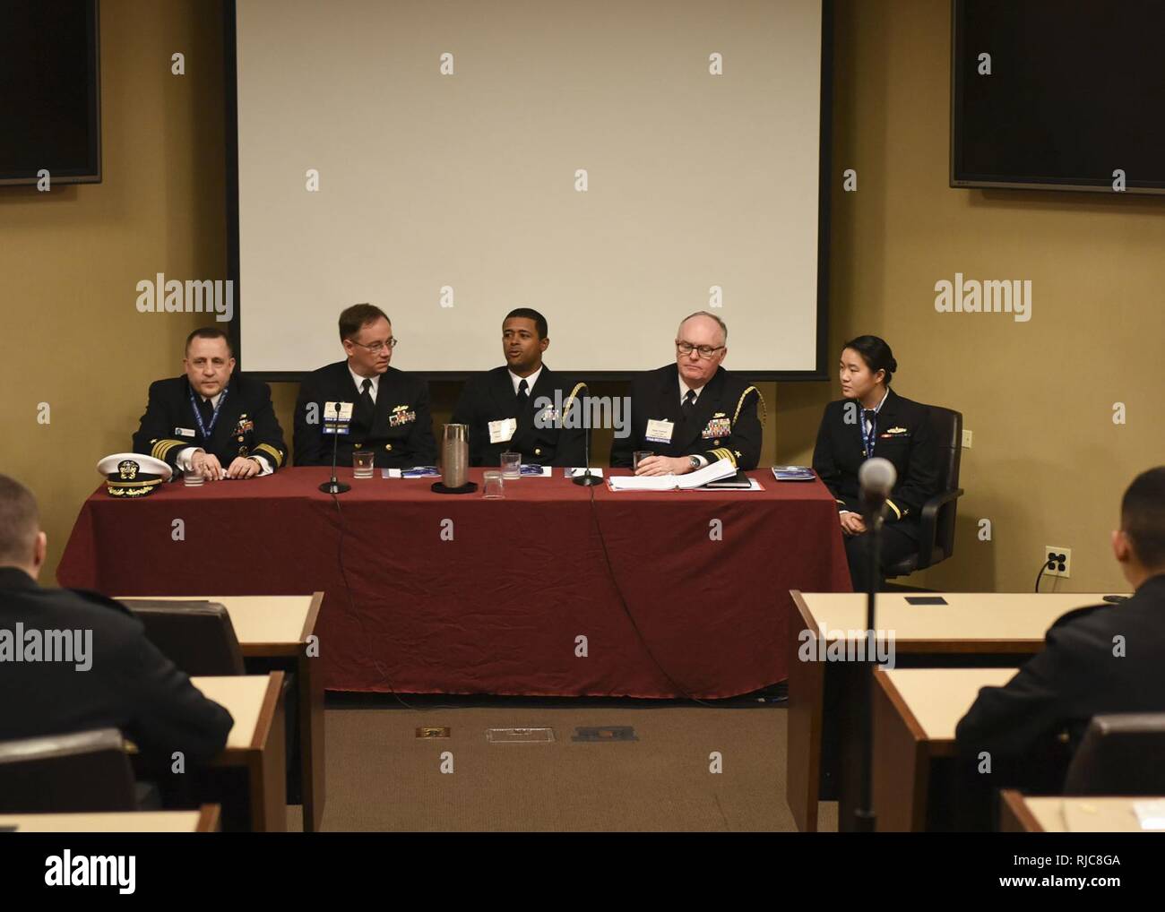 CRYSTAL CITY, Va. (Jan. 09, 2018) Panelists speak to midshipman during ...