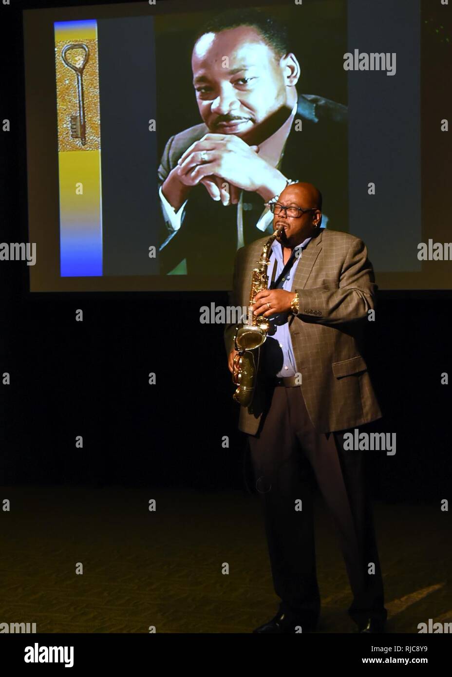 Recording artist, Rodney Taylor, plays a saxophone solo in honor of Dr ...