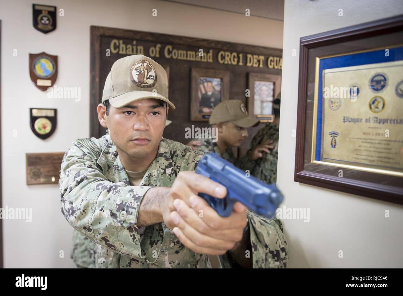 U.S. Navy Master at Arms 2nd Class Bernard P. Servillas, assigned to ...