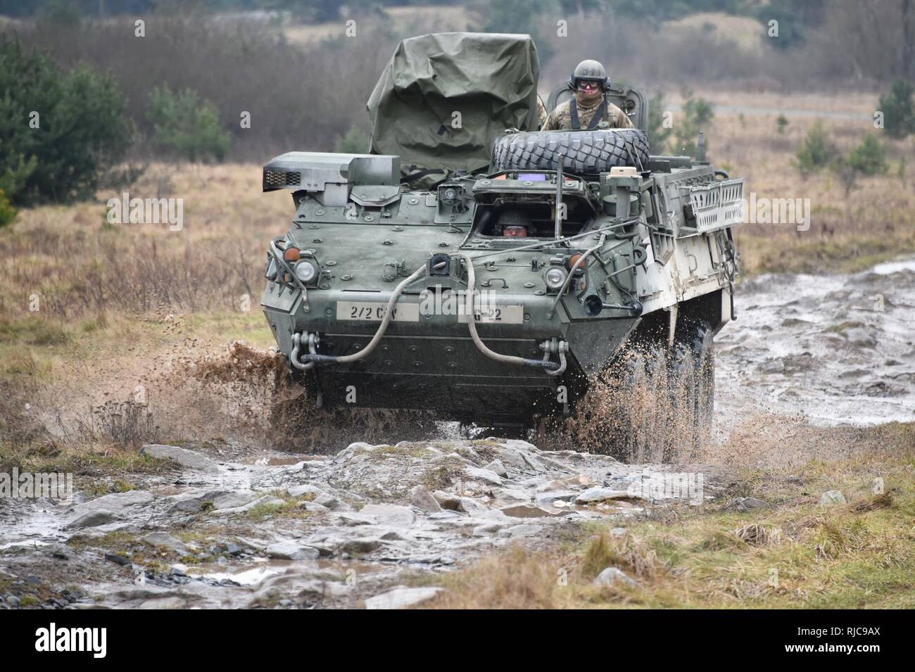 U.S. Soldiers with 2d Squadron, 2d Cavalry Regiment maneuver a Stryker ...