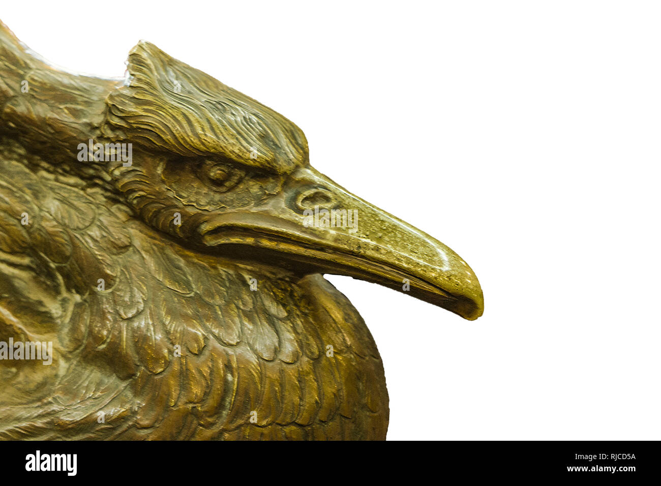 Isolated creepy bird bronze sculpture against white background Stock ...