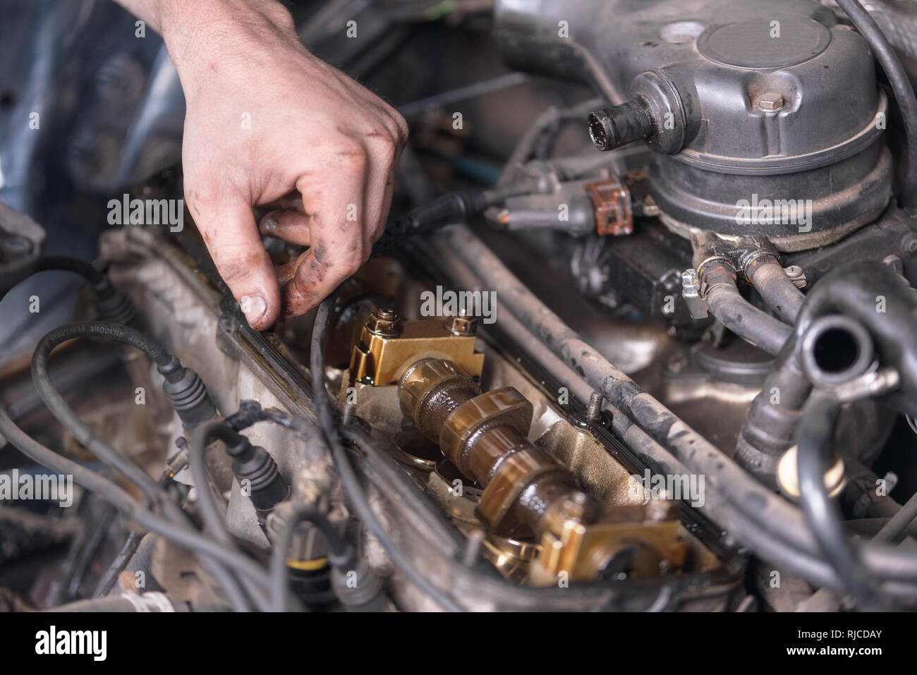 Mechanic working on car engine hi-res stock photography and images - Alamy