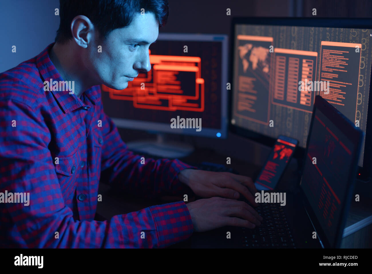 Hacker Typing Program Code While Committing A Cybercrime Hacking A