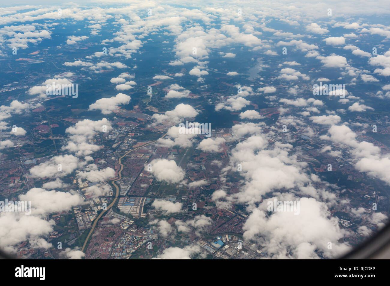 Looking through window aircraft during flight in wing with a nice blue ...