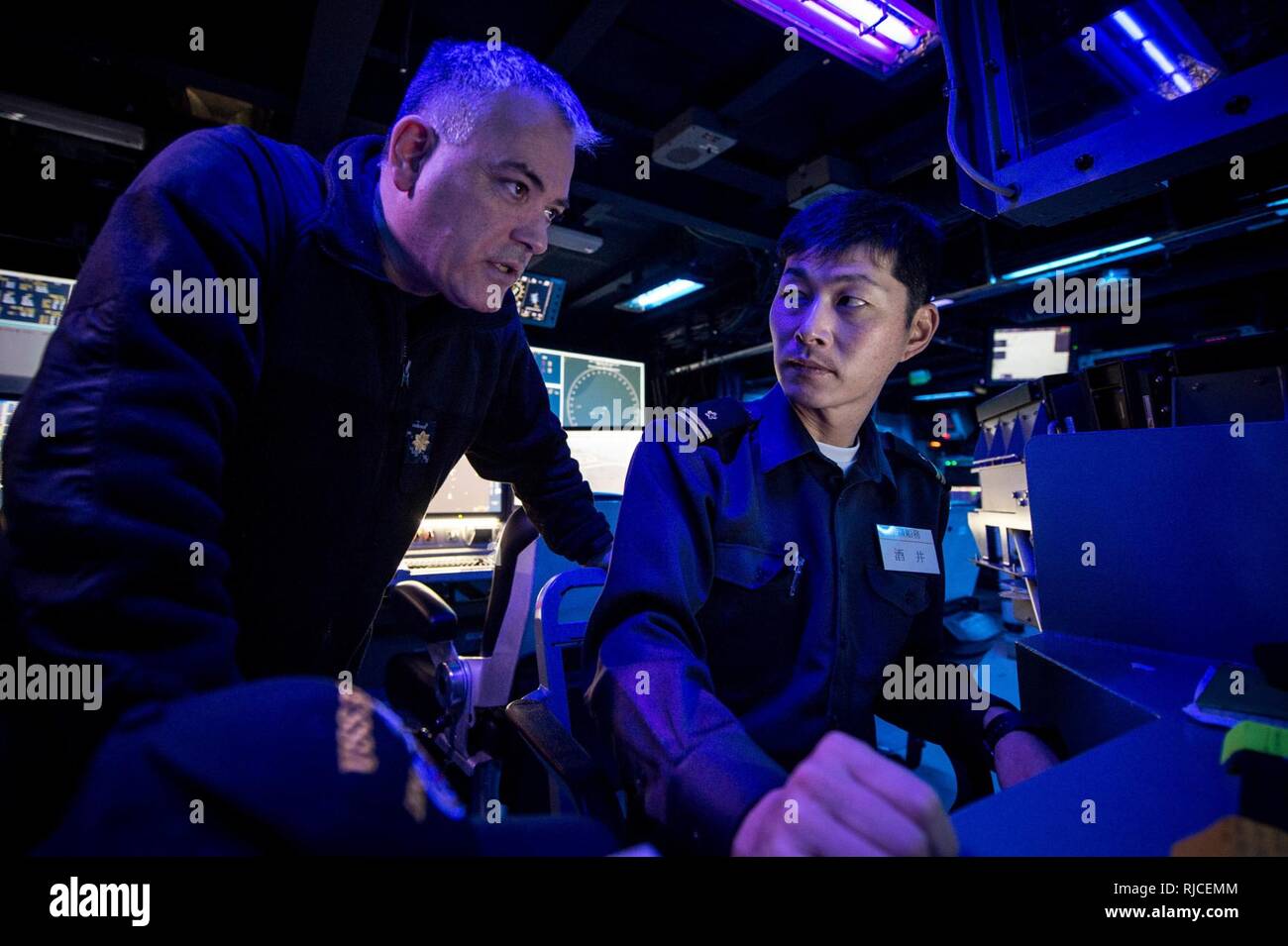 WATERS EAST OF JAPAN (Nov. 4, 2016) Lt.Cmdr. Brian Gauthier, left ...
