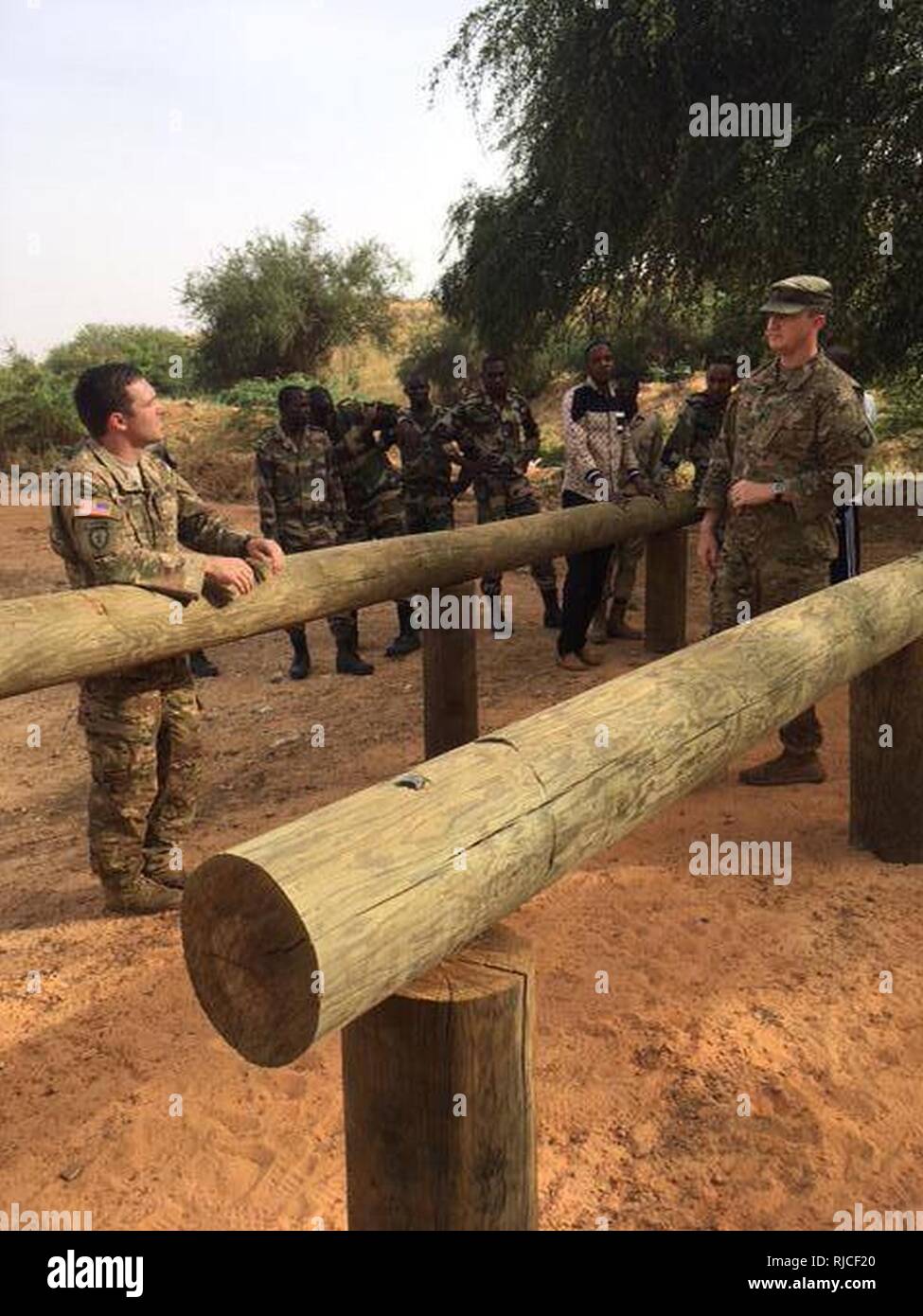 Sgt. 1st Class Michael Mullins instructs the officers of Nigerien Armed ...