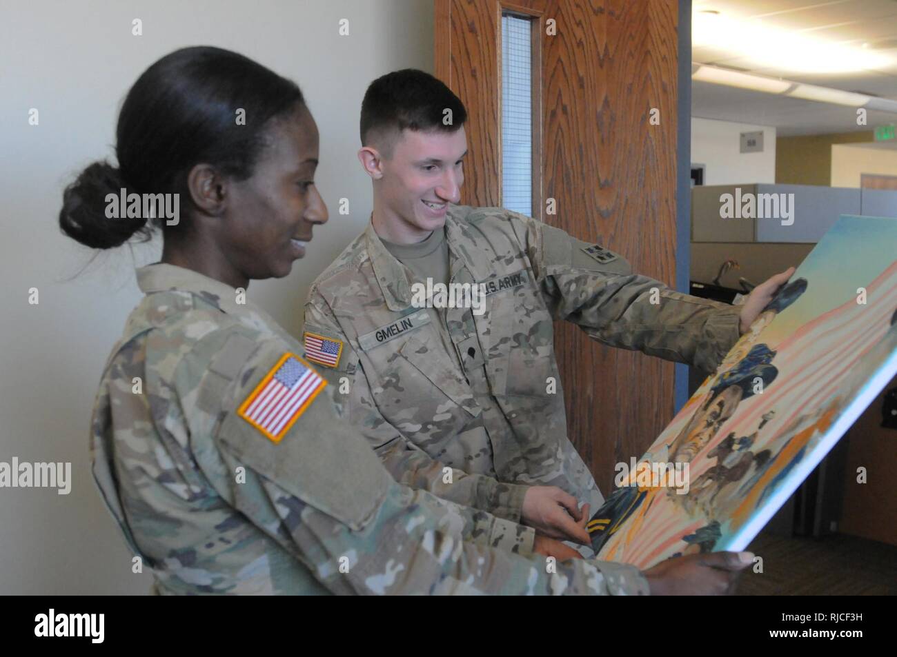 FORT CARSON, Colorado – Capt. Shaloe Green, left, the administrative ...