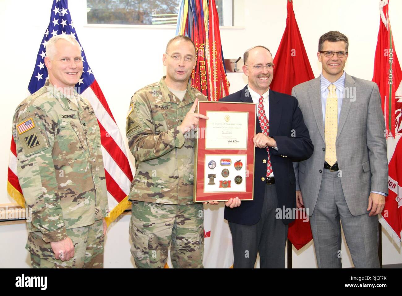 Col. Christopher Barron and Scott Acone stand with Brig. Gen. William ...