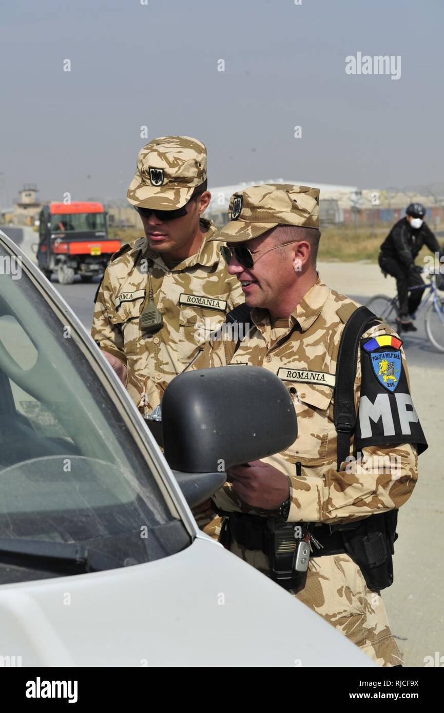 First Sgt. (Plutonier-major) Victor Balan and Cpl. (Caporal) Marius ...