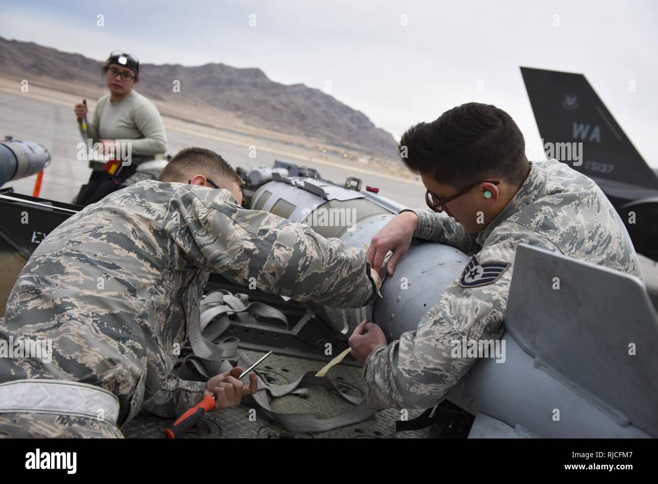Airman 1st Class Leilani Emilo, Senior Airman Jacob Carter and Staff ...
