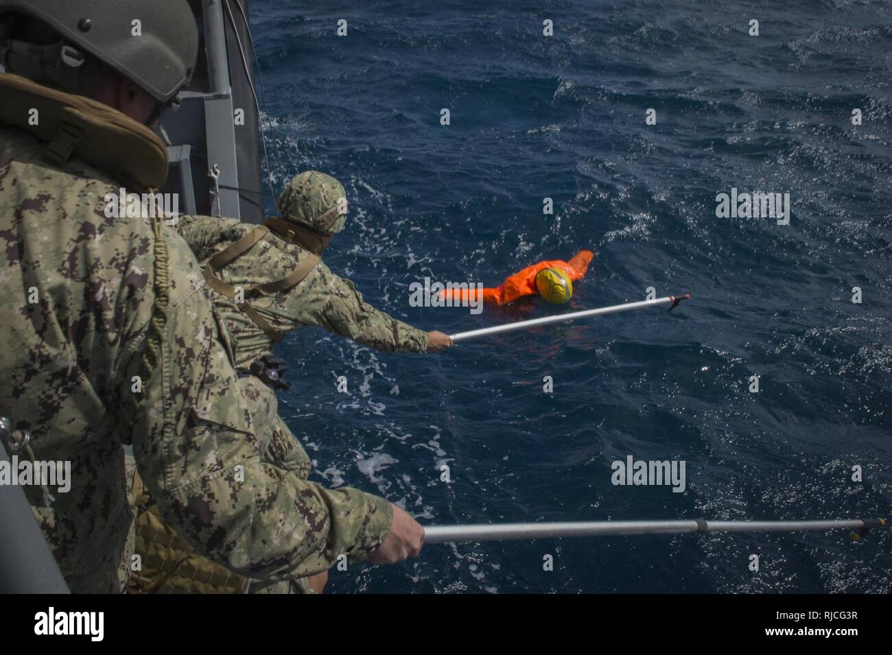 U.S. Navy Sailors, assigned to Coastal Riverine Squadron (CRS) 2 ...
