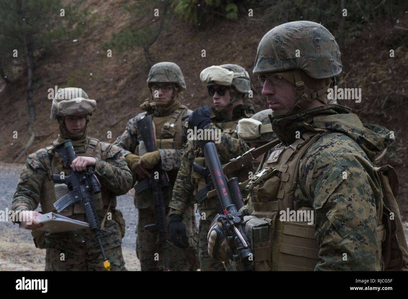 U.S. Marines with Marine Wing Support Squadron (MWSS) 171 conduct zone ...
