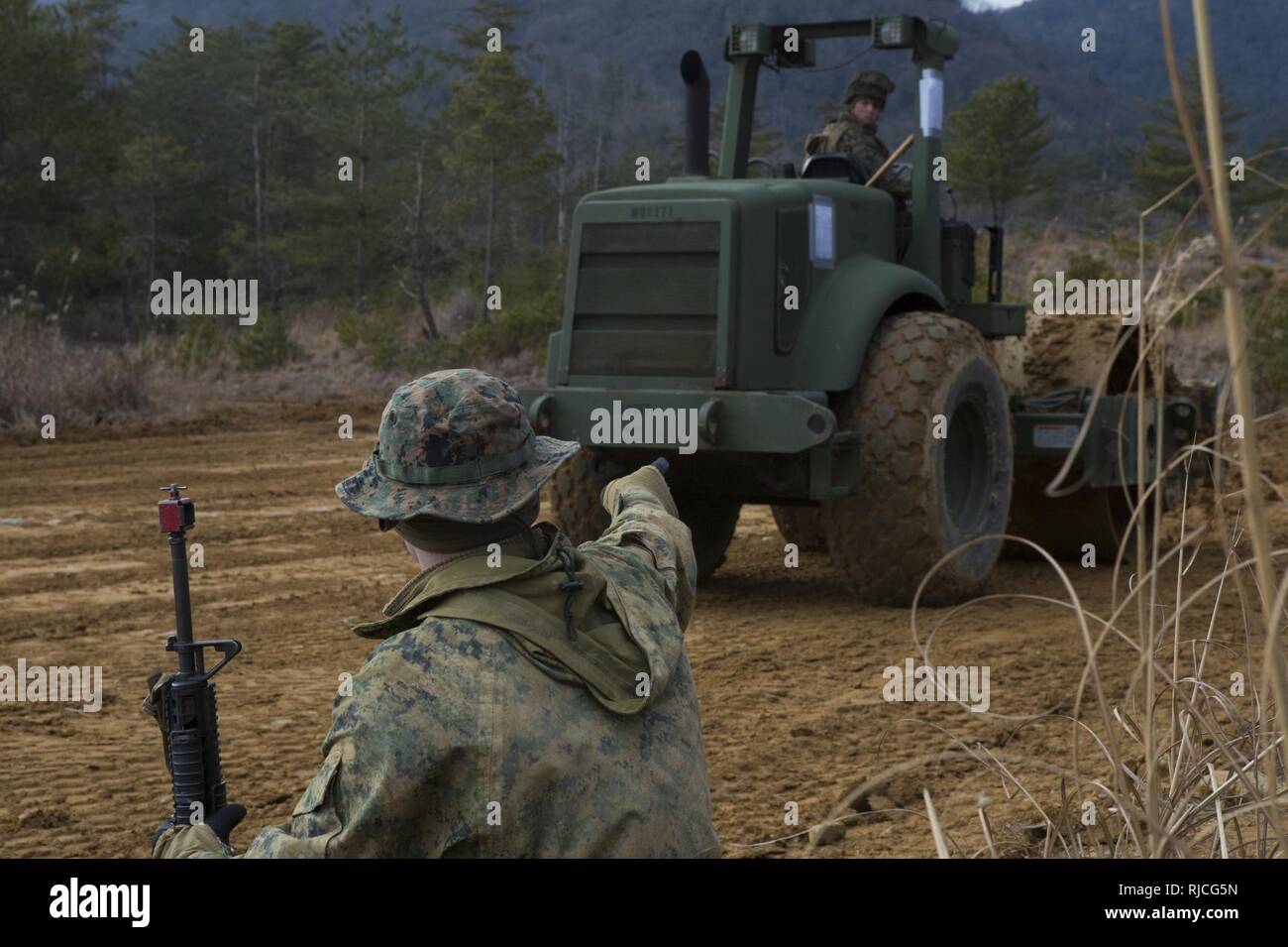 U.S. Marines with Marine Wing Support Squadron (MWSS) 171 flatten ...