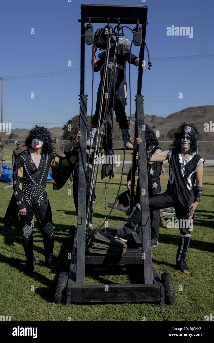 U.S. Marines with 11th Marine Regiment, 1st Marine Division, pose for a ...