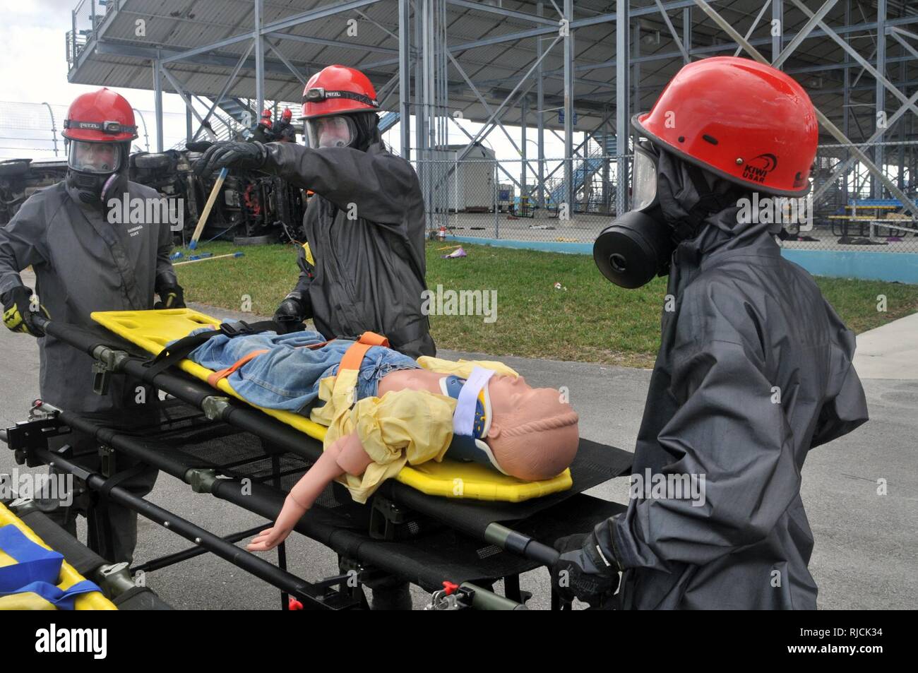U.S. Army Reserve Sgt. Ian Tweeddale, center, shows Spc. Robert ...