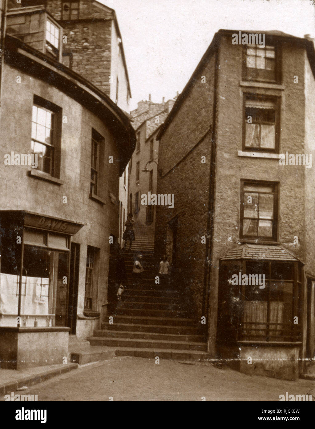 Street scene with narrow steps between buildings Stock Photo - Alamy