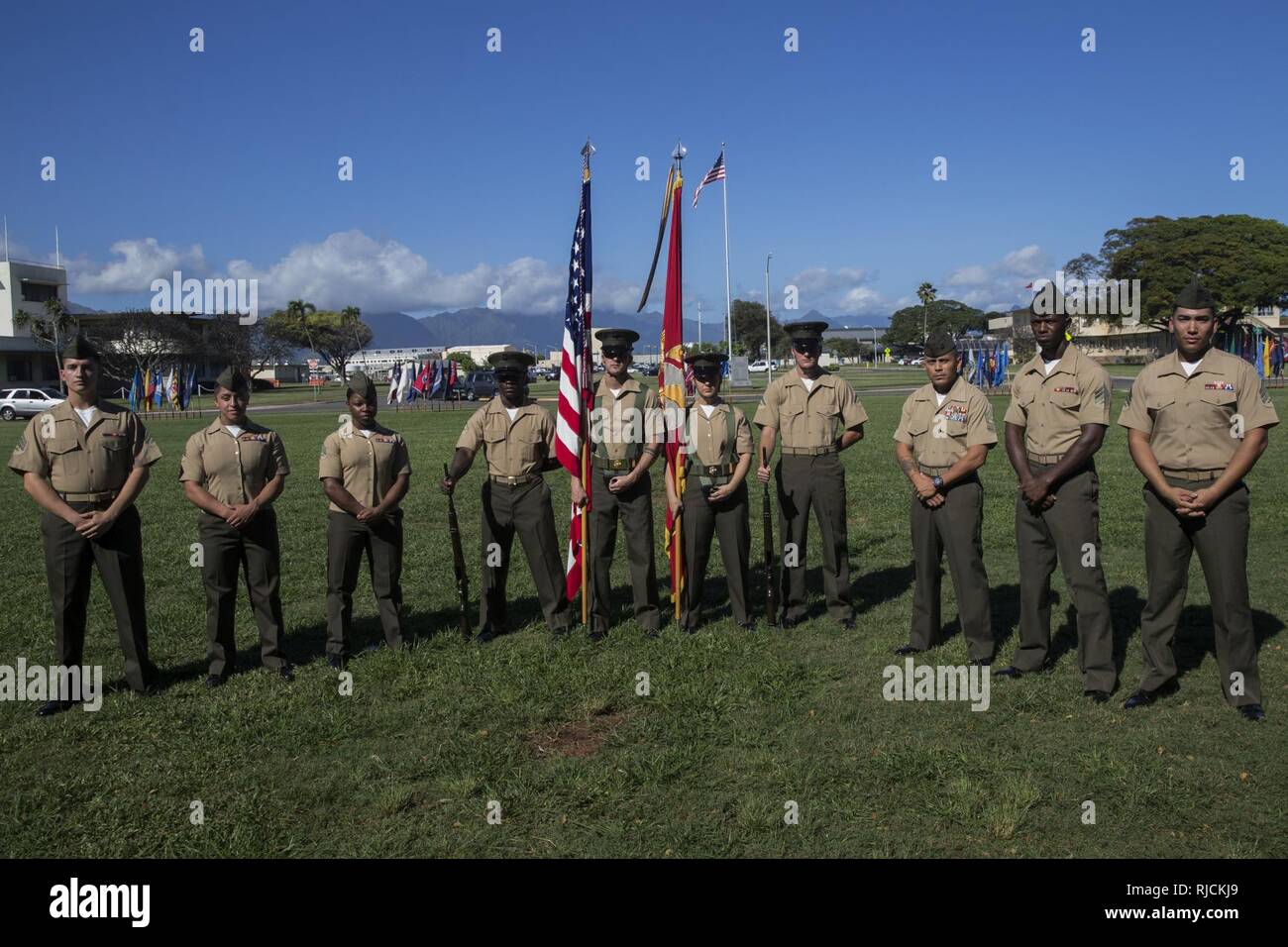 U.S. Marines with the ceremonial staff of the sergeant major relief and ...