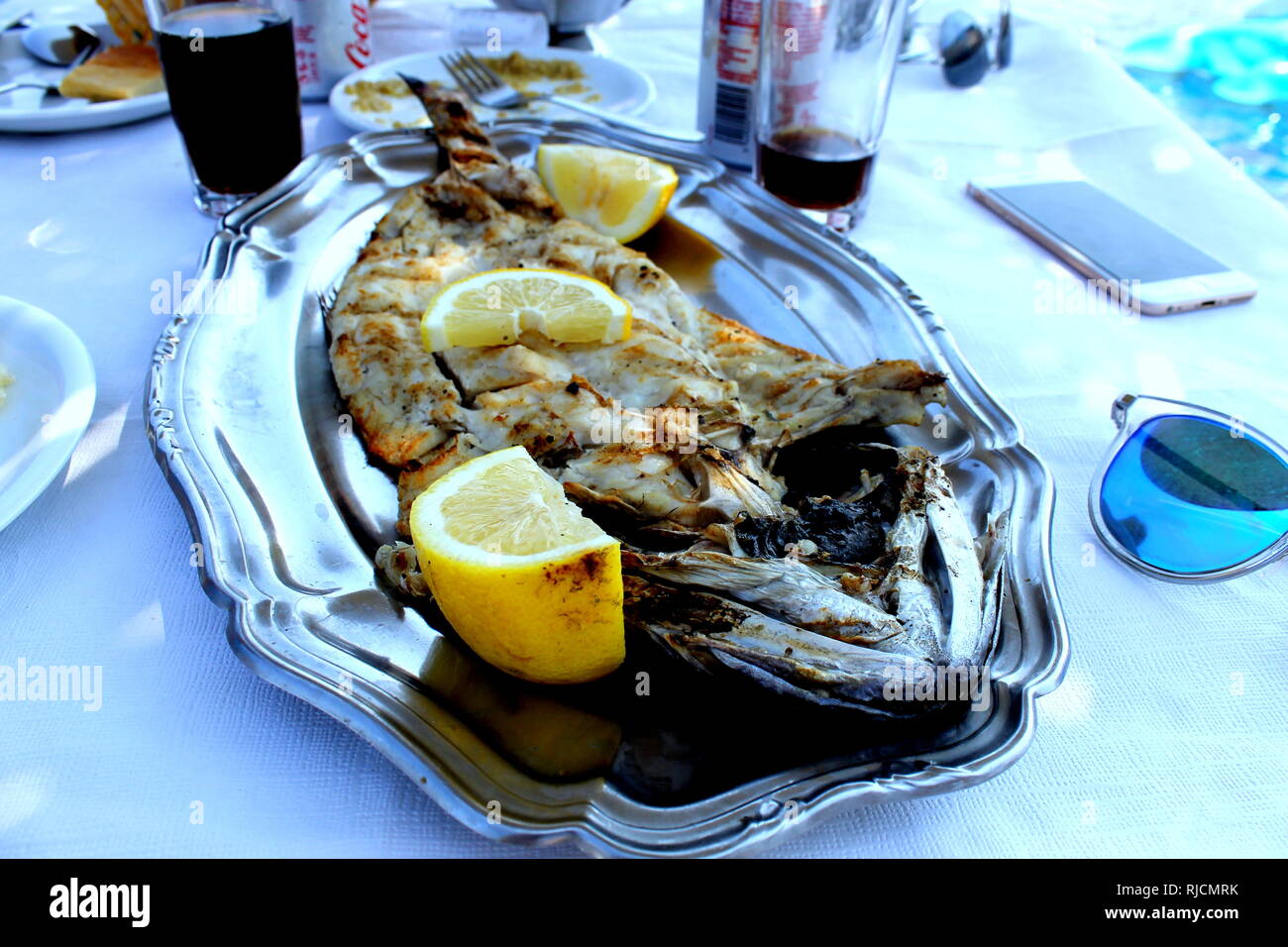 Grilled fish in summer outdoor Stock Photo - Alamy