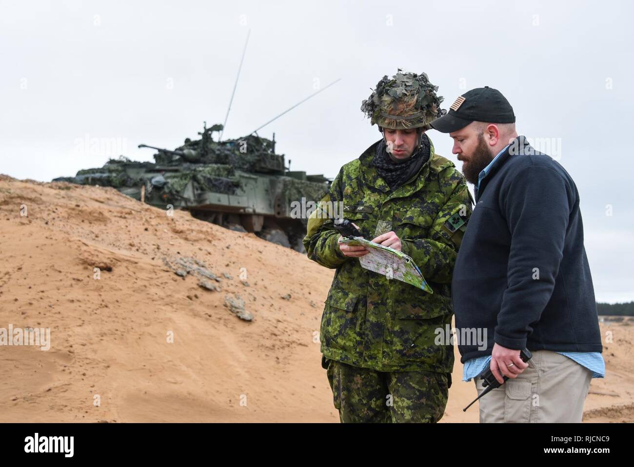 Bobby Lightner, right, a Range and Training Land Program Specialist ...