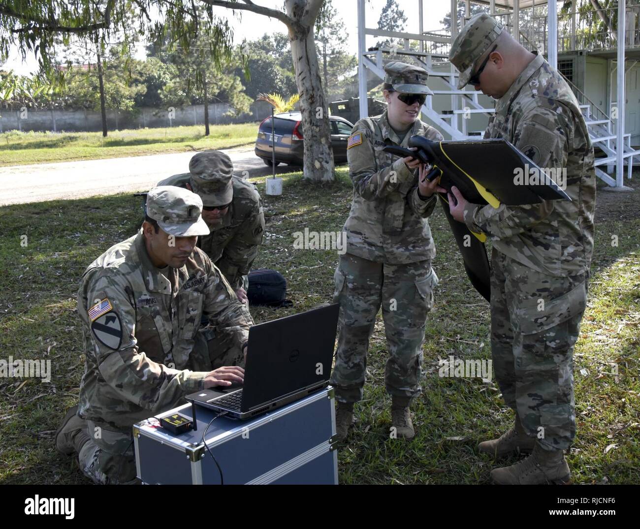 U.S. Army engineers with Joint Task Force-Bravo monitor the associated ...