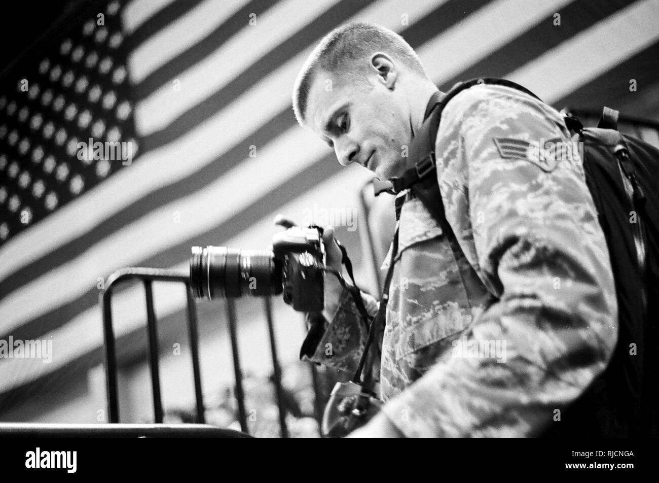 Senior Airman Curt Beach, assigned to the 673d Air Base Wing, switches ...