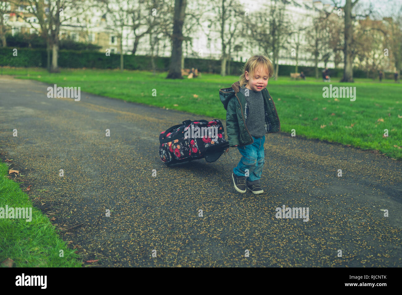 Pulling Suitcase Child High Resolution Stock Photography and Images - Alamy