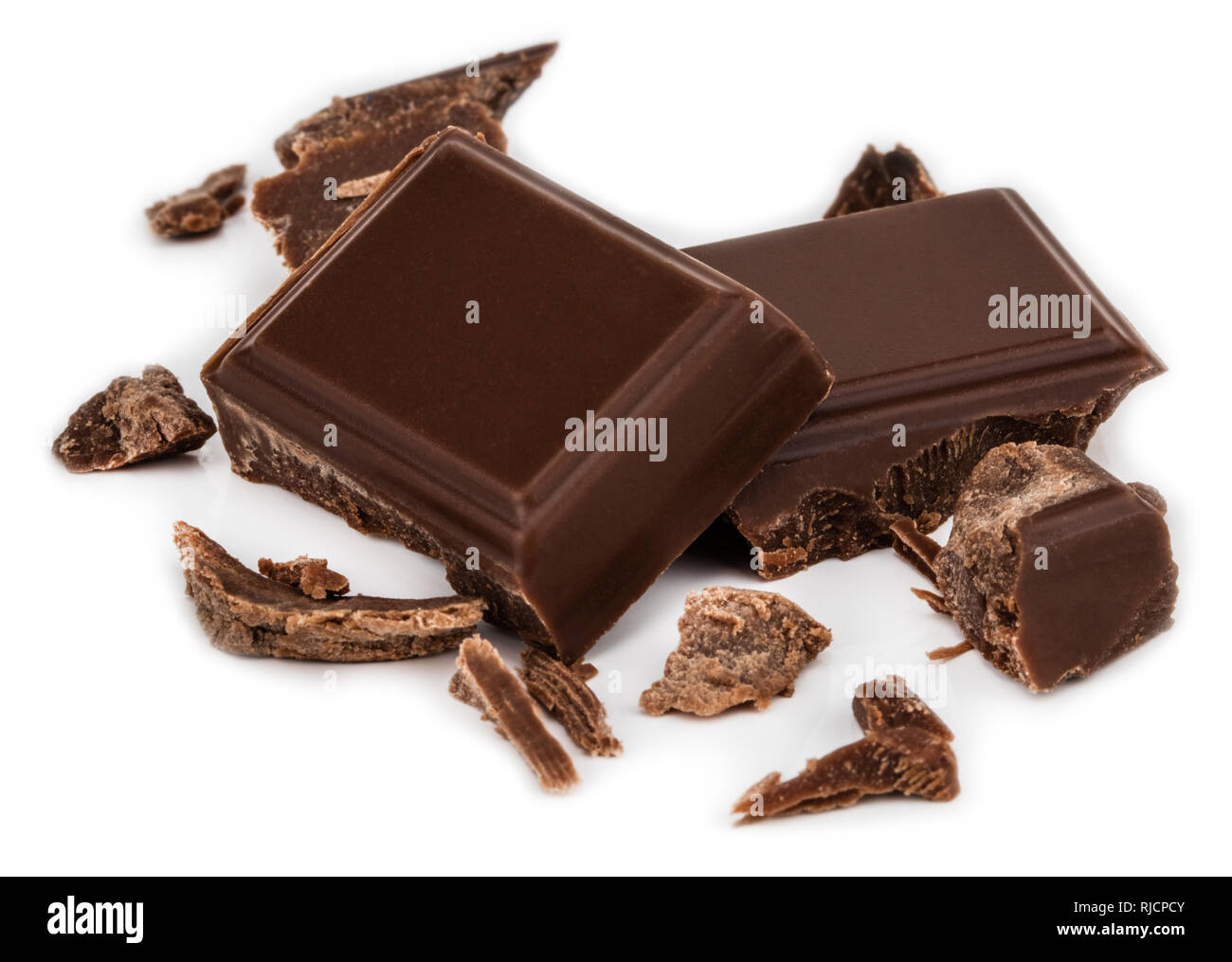 Milk chocolate pieces isolated on white background from top view Stock ...