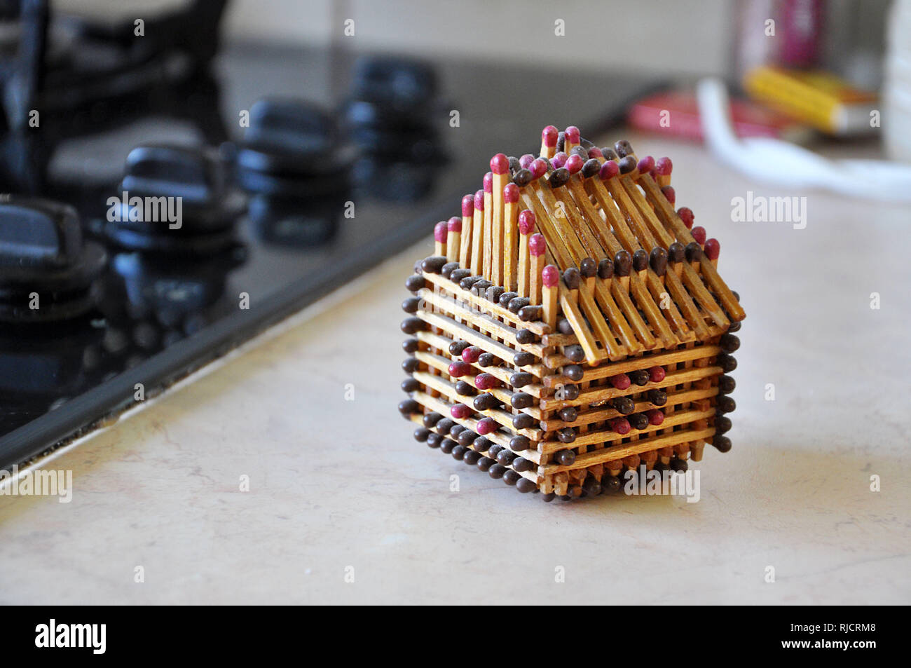 Model of a house from matches. - Image Stock Photo - Alamy