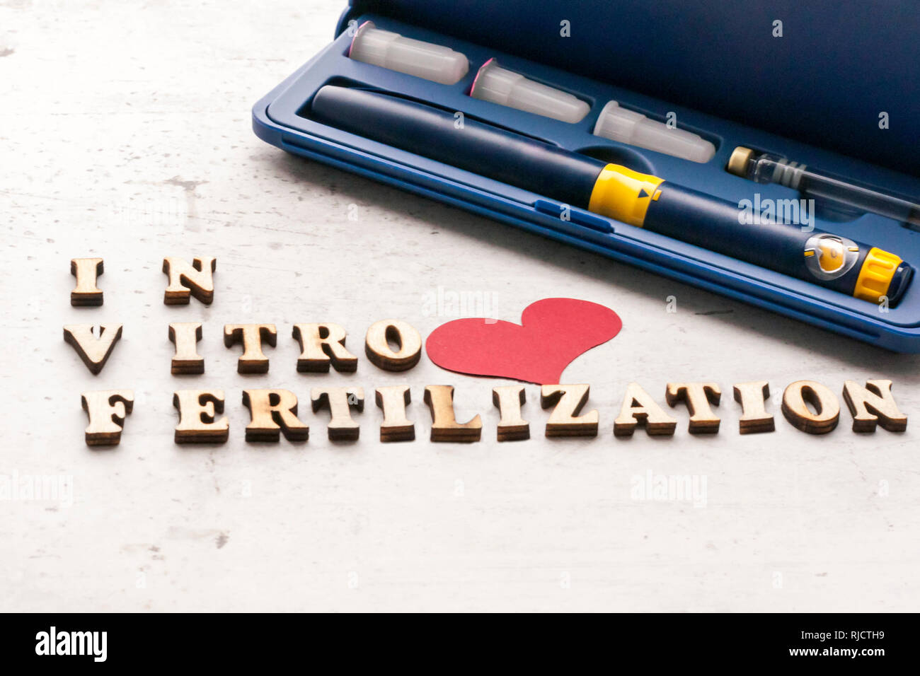 In Vitro Fertilization Injection Pen. Syringe with a thin ogre. Concept ...