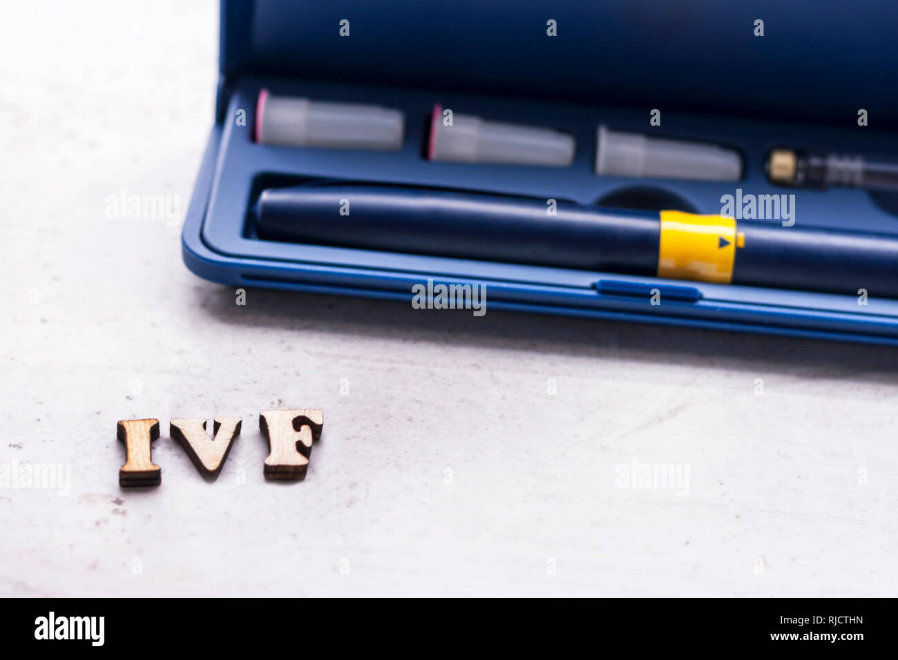 In Vitro Fertilization Injection Pen. Syringe with a thin ogre. Concept ...