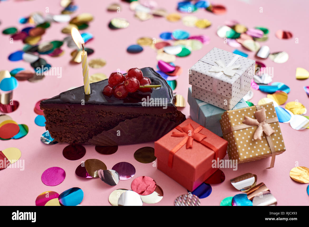 Ready to blow the candles A slice of chocolate cake with candle and ...