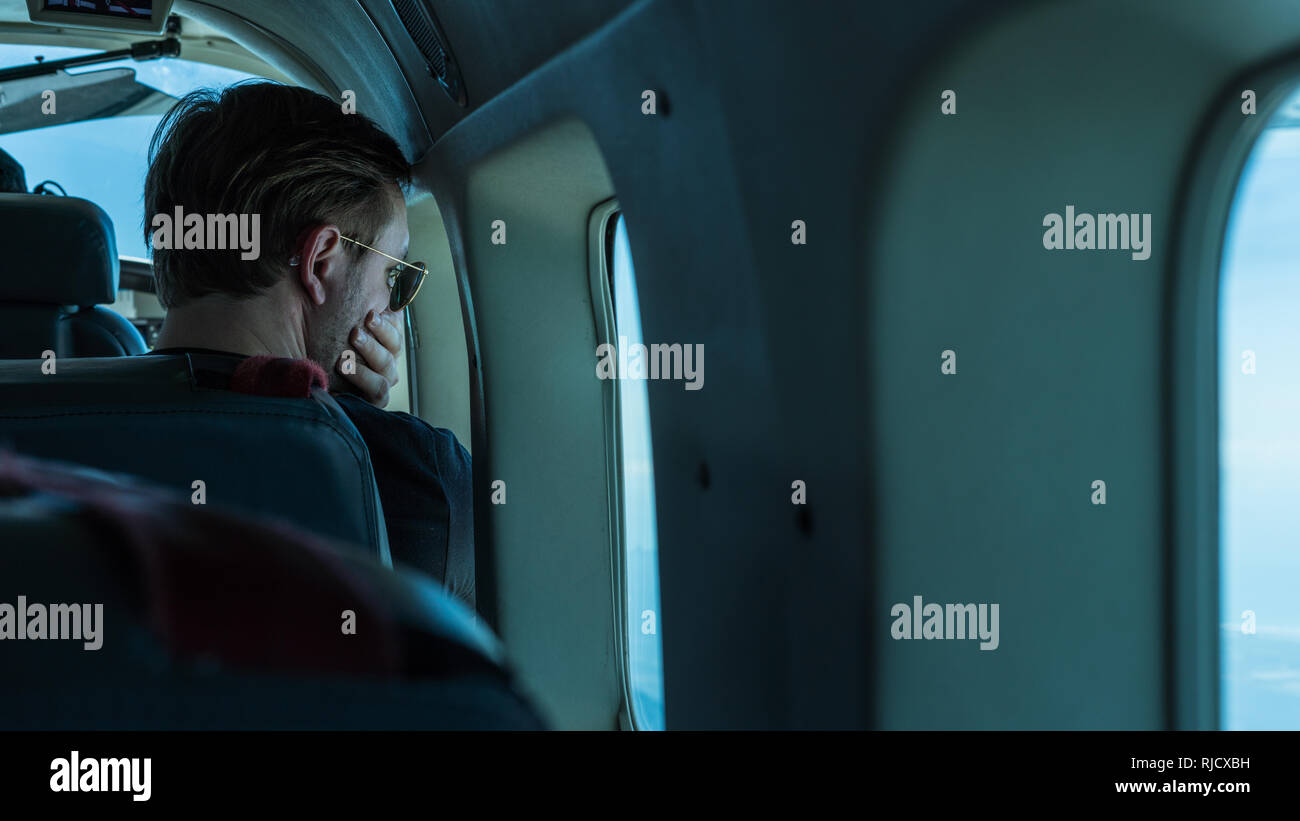 Commercial pilot looking plane window hi-res stock photography and ...