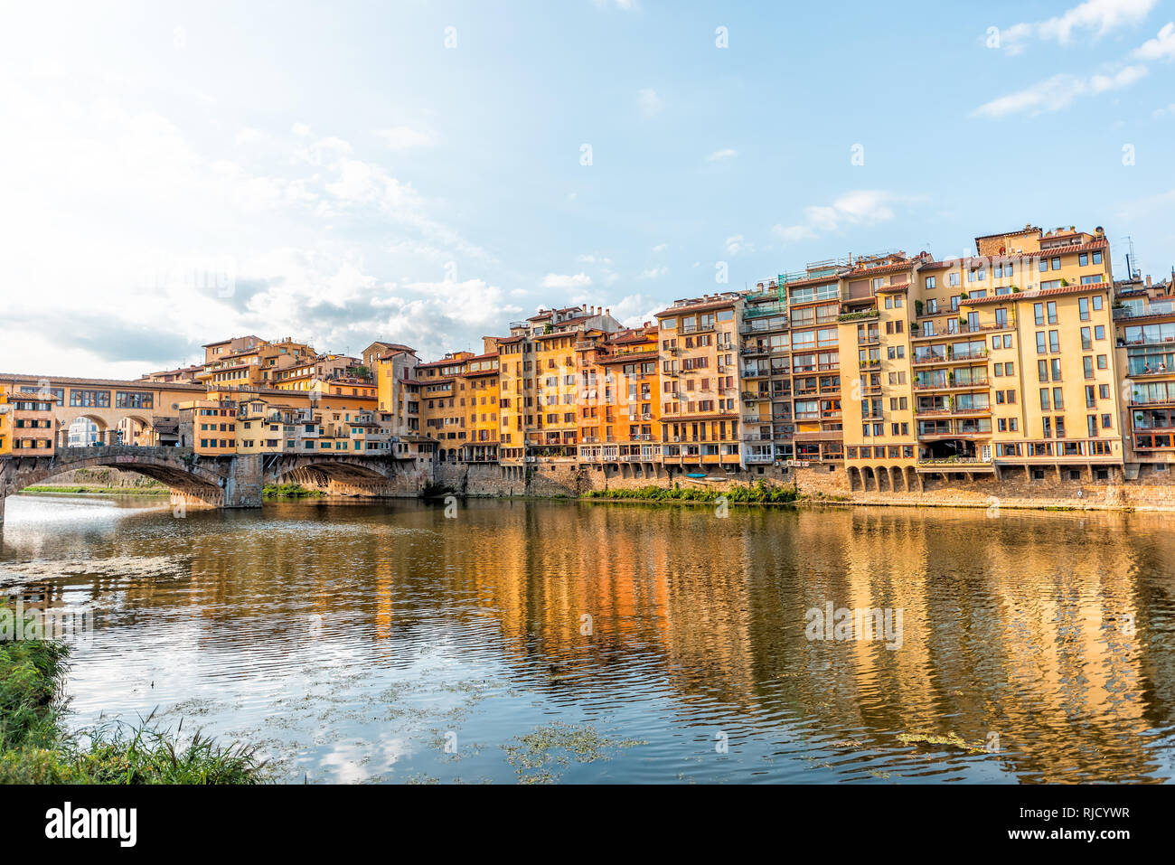 Florence, Italy Firenze orange yellow colorful buildings and Arno river ...