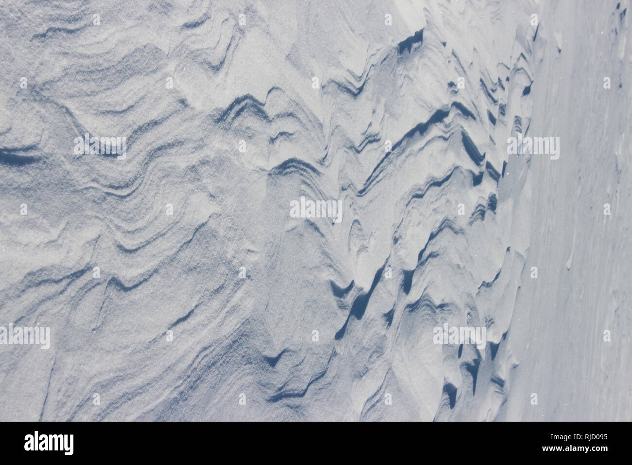 Snow Formations - windy patterns in snow 1 Stock Photo - Alamy