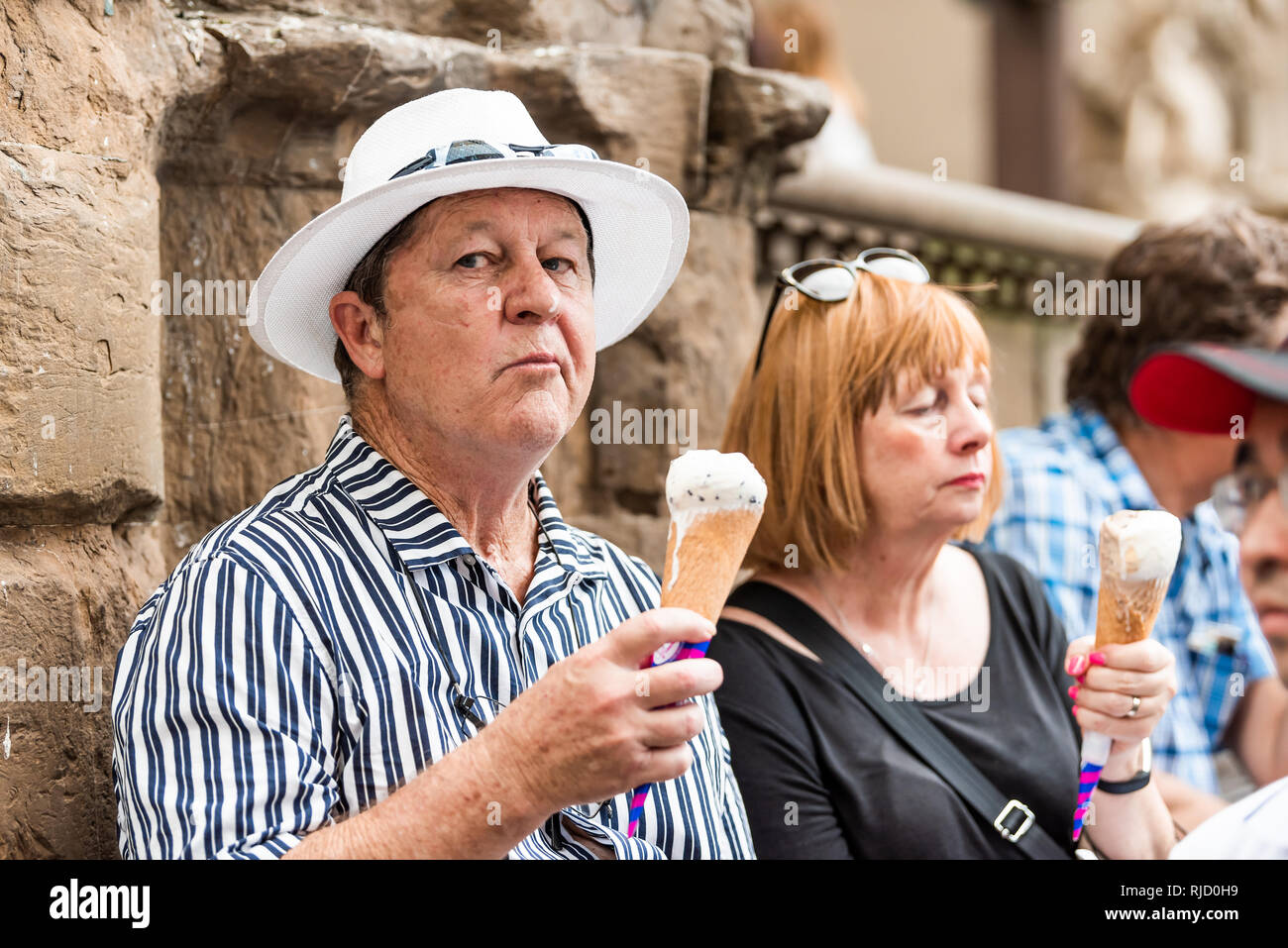 Florence, Italy - August 30, 2018: Funny man tourist senior couple ...